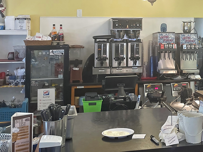 The coffee station stands ready for duty like a caffeinated command center, promising the fuel needed for tackling those massive pancakes.