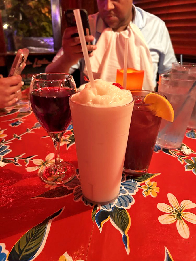 The drink lineup at Louis Louis &ndash; where frozen concoctions meet sophisticated sips, proving that vacation mode comes in all forms of glassware.