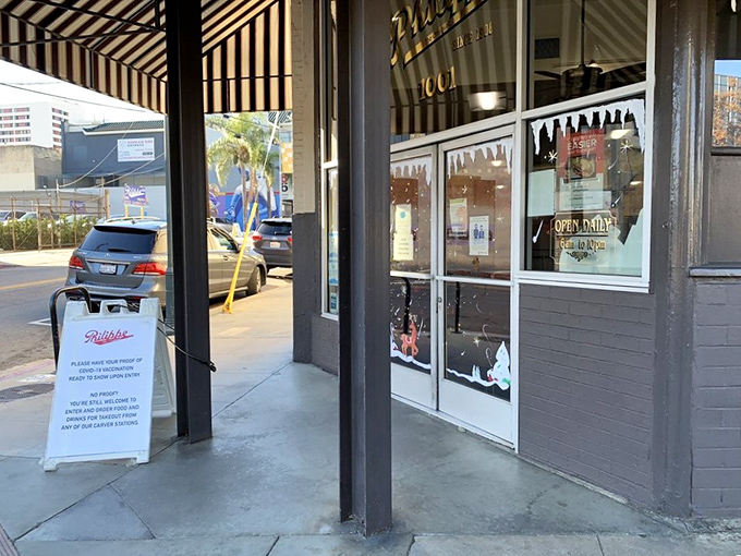 The entrance promises no frills, just fulfillment – a doorway to one of Los Angeles' most enduring culinary traditions.