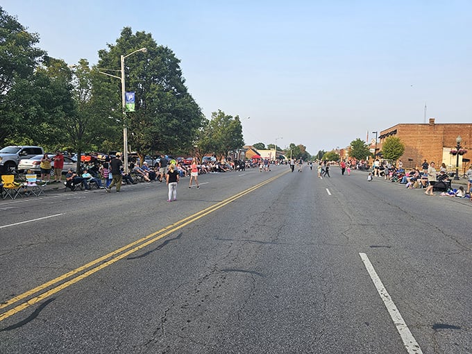Small-town parades where everyone knows someone in the procession and strangers become friends over shared applause and candy tosses.