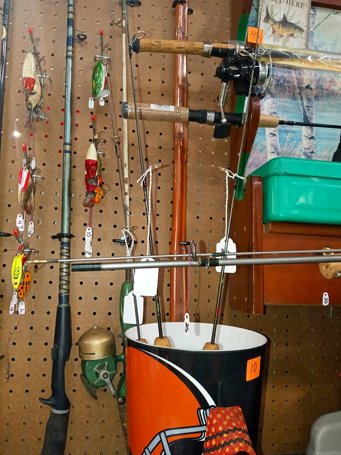 Fisherman's fantasy wall! Tackle and rods for every water adventure, because sometimes the best therapy costs less than actual therapy.