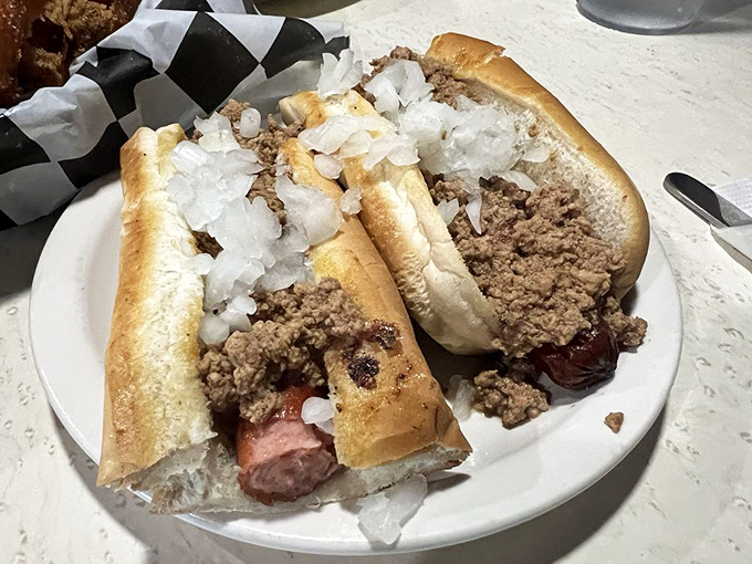 Hot dogs dressed for success with generous toppings. Street food elevated to diner art form &ndash; messy, magnificent, and absolutely worth the napkins.