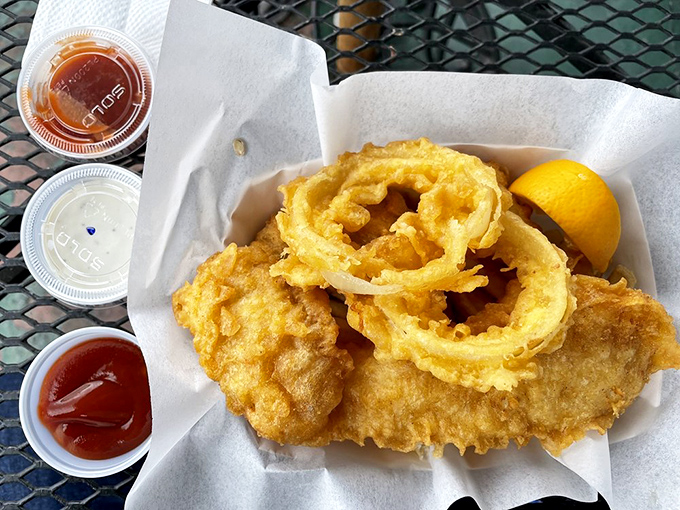 Fish and onion rings presented with the confidence of knowing no fancy plate could improve what generations of seafood lovers have perfected.