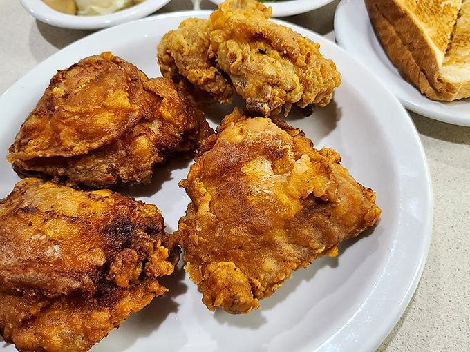 Fried chicken with that golden-brown crust that makes a satisfying crackle when your fork breaks through. Colonel who? This is the real deal.