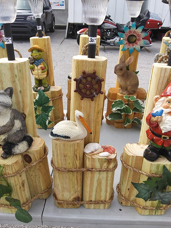 Garden gnomes and pelicans living in harmony&mdash;the Florida yard decoration ecosystem at its most charming. 