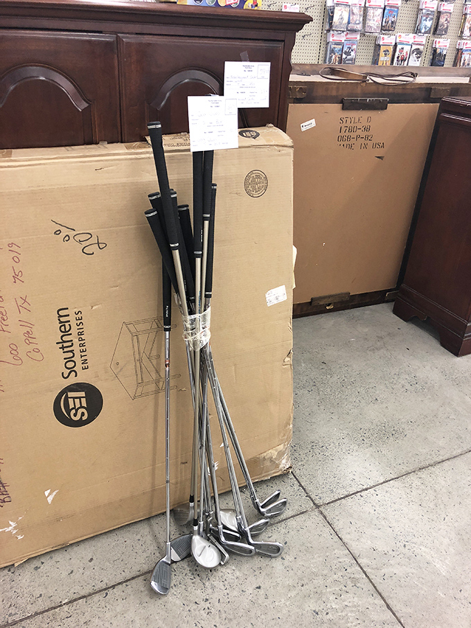 Golf clubs lean casually against furniture boxes, like old friends at a reunion. Weekend warriors can upgrade their game without upgrading their credit card debt.