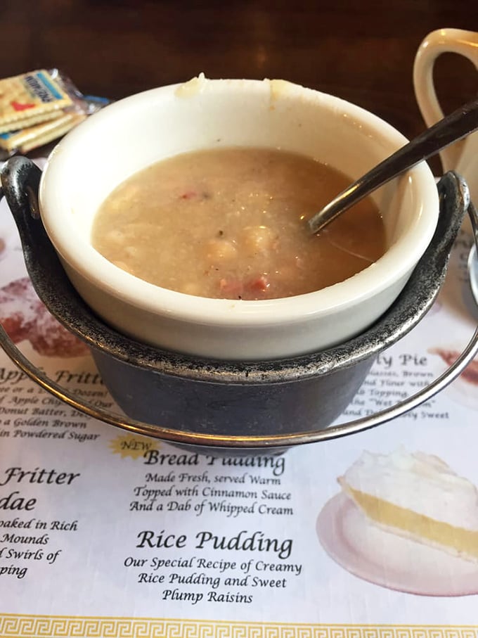 Soup that looks like it simmered while several generations of cooks told it family stories. Served in a crock that keeps its secrets &ndash; and its heat &ndash; wonderfully well.