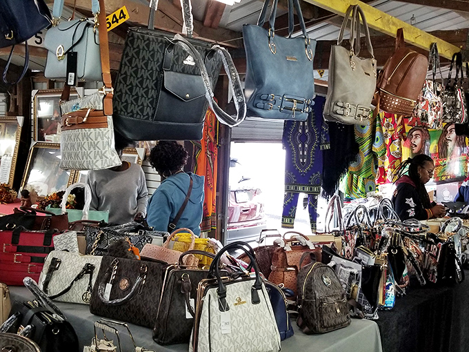 Handbag heaven suspended from every available inch. Designer lookalikes mingle with genuine vintage finds in this accessory wonderland.
