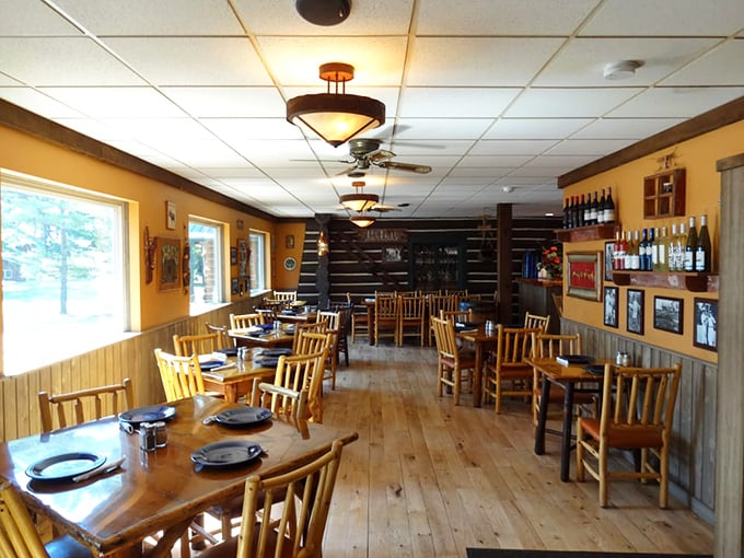 Knotty pine and golden light create the perfect stage for memorable meals. Every table feels like the best seat in the house. 