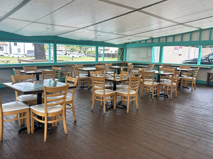 More wooden tables await hungry souls seeking authentic flavors in this refreshingly honest dining space.