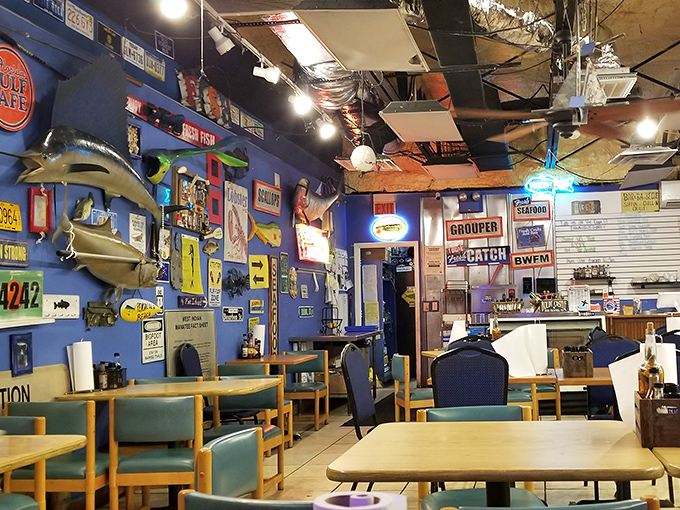 The dining area feels like a fisherman's living room&mdash;comfortable, unpretentious, and filled with treasures from the sea, both on plates and adorning walls.