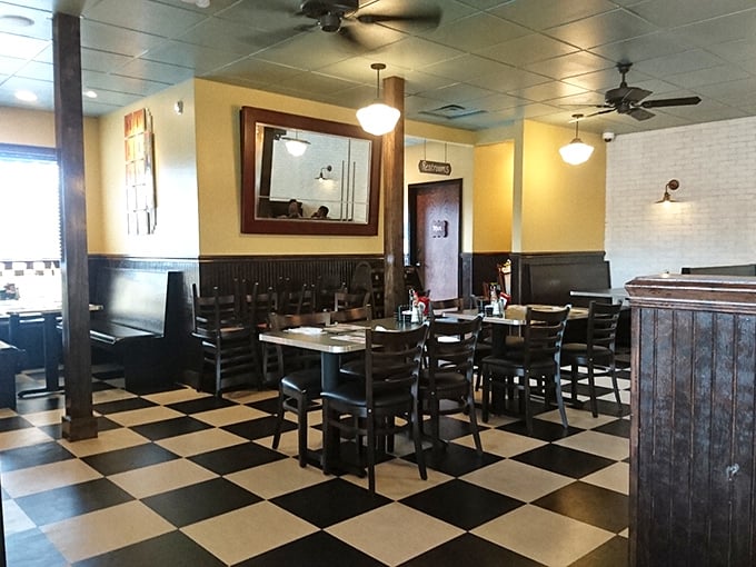 Warm yellow walls and dark wood create that perfect diner atmosphere where calories don't count and conversations flow easily.