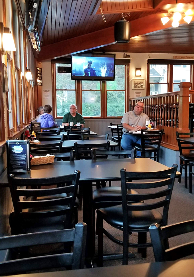 Morning light streams through windows as early birds catch their breakfast—Jake's dining room has that rare quality of feeling both spacious and cozy simultaneously.