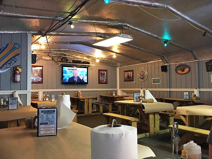 The dining room feels like the galley of a particularly comfortable fishing boat, where seafood stories are traded over cracked shells.