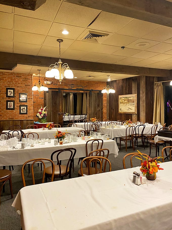 Private dining spaces maintain the same cozy charm with white linens and warm lighting.