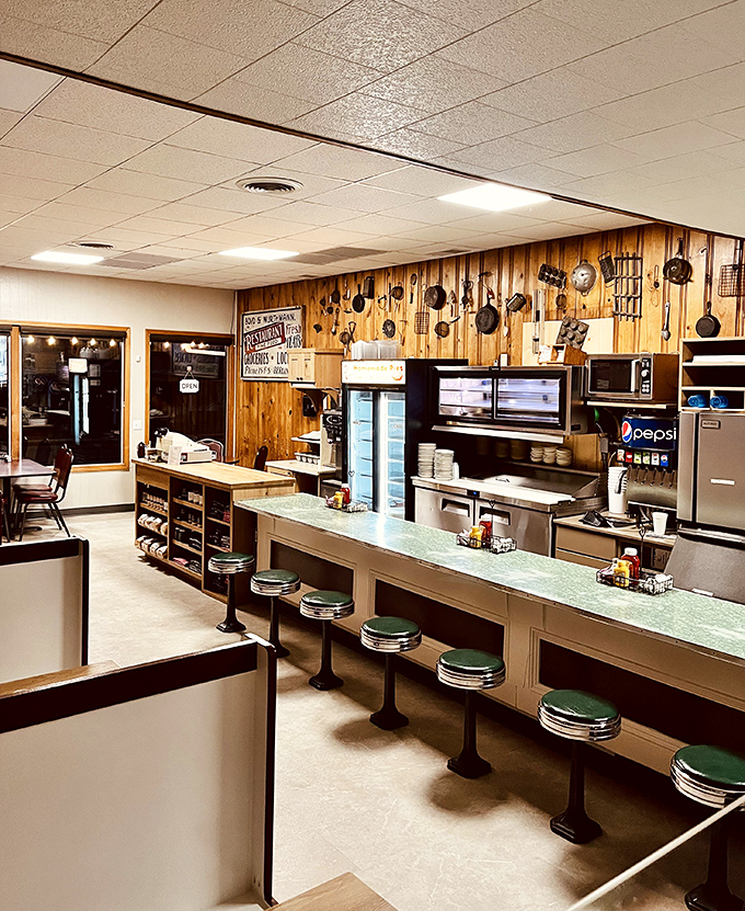 The classic diner counter where locals gather, stories flow, and coffee cups never stay empty.