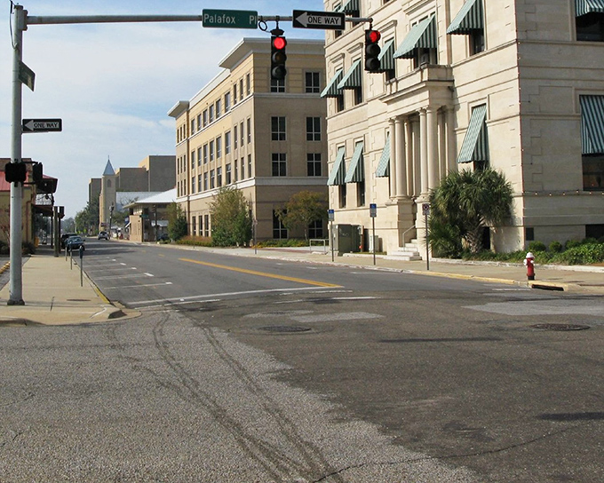 Palafox Street's intersection captures Pensacola's blend of historic charm and modern convenience. Those traffic lights have seen some things.