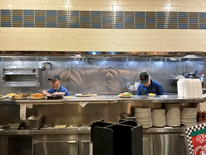 Where the magic happens&mdash;skilled cooks orchestrating a delicious symphony of sizzles and flips behind a gleaming stainless steel stage.