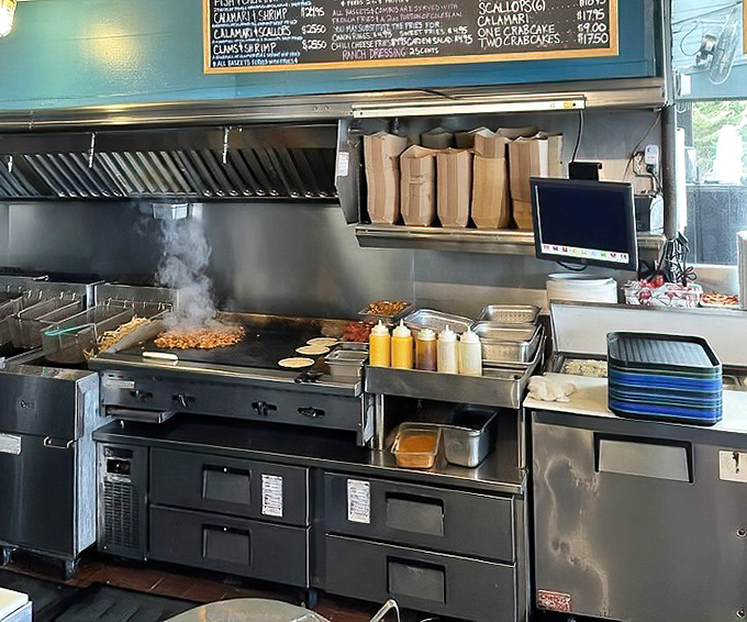 Where the magic happens! Neptune's Net's kitchen sizzles with activity, transforming fresh catches into the coastal classics that keep California coming back for more.