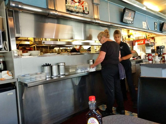 Behind every great diner meal is a kitchen ballet of efficiency. These choreographers of comfort food move with practiced precision honed over countless breakfasts.