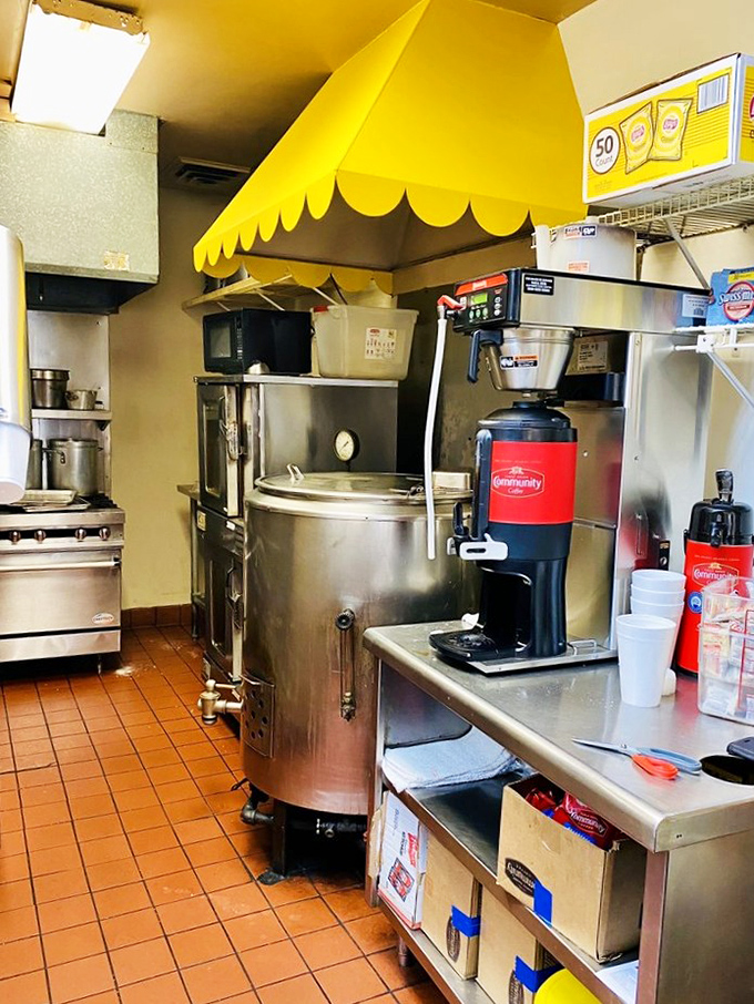 The kitchen's yellow awning shelters the magical cauldron where their famous chili has simmered its way into Nashville history.