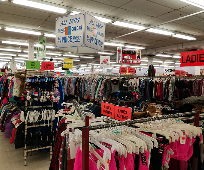 Half-price tag day&mdash;when the thrill of the hunt gets even more exciting. The red signs practically shout "bargain alert!"