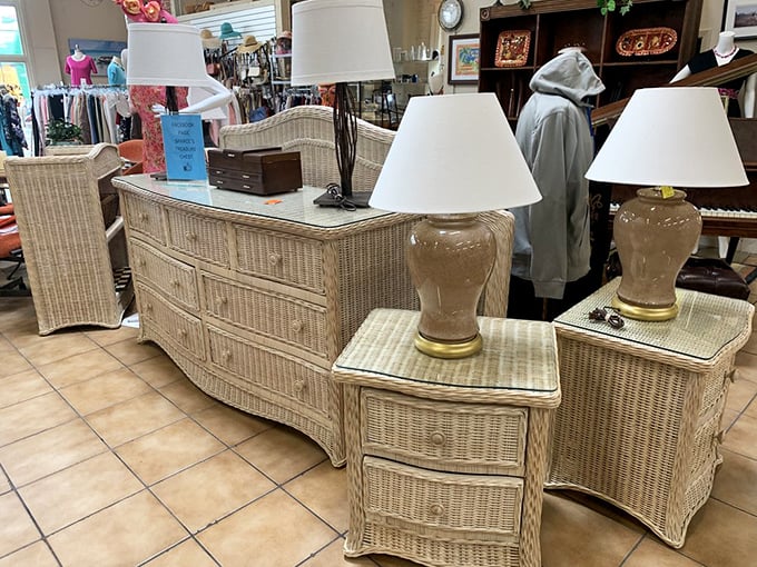 Wicker furniture that whispers "coastal grandmother aesthetic" before that was even a thing&mdash;complete with lamps that have seen some stories.