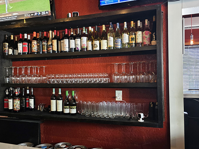 The impressive liquor display proves Engine No. 9 takes its drinking as seriously as its burgers. Wine glasses stand ready for the sophisticated burger lover.