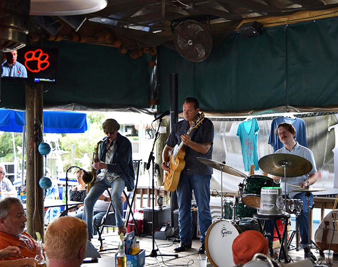 Live music adds the perfect soundtrack to fresh seafood and cold drinks. These aren't tourist performers&mdash;they're the authentic sound of Florida's Gulf Coast.