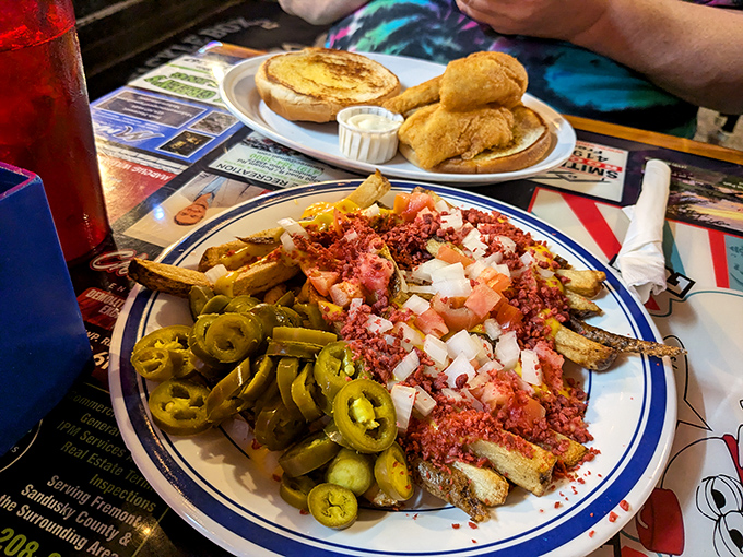 Fries loaded with enough toppings to qualify as their own food group. A beautiful mess that requires both fork and fingers.