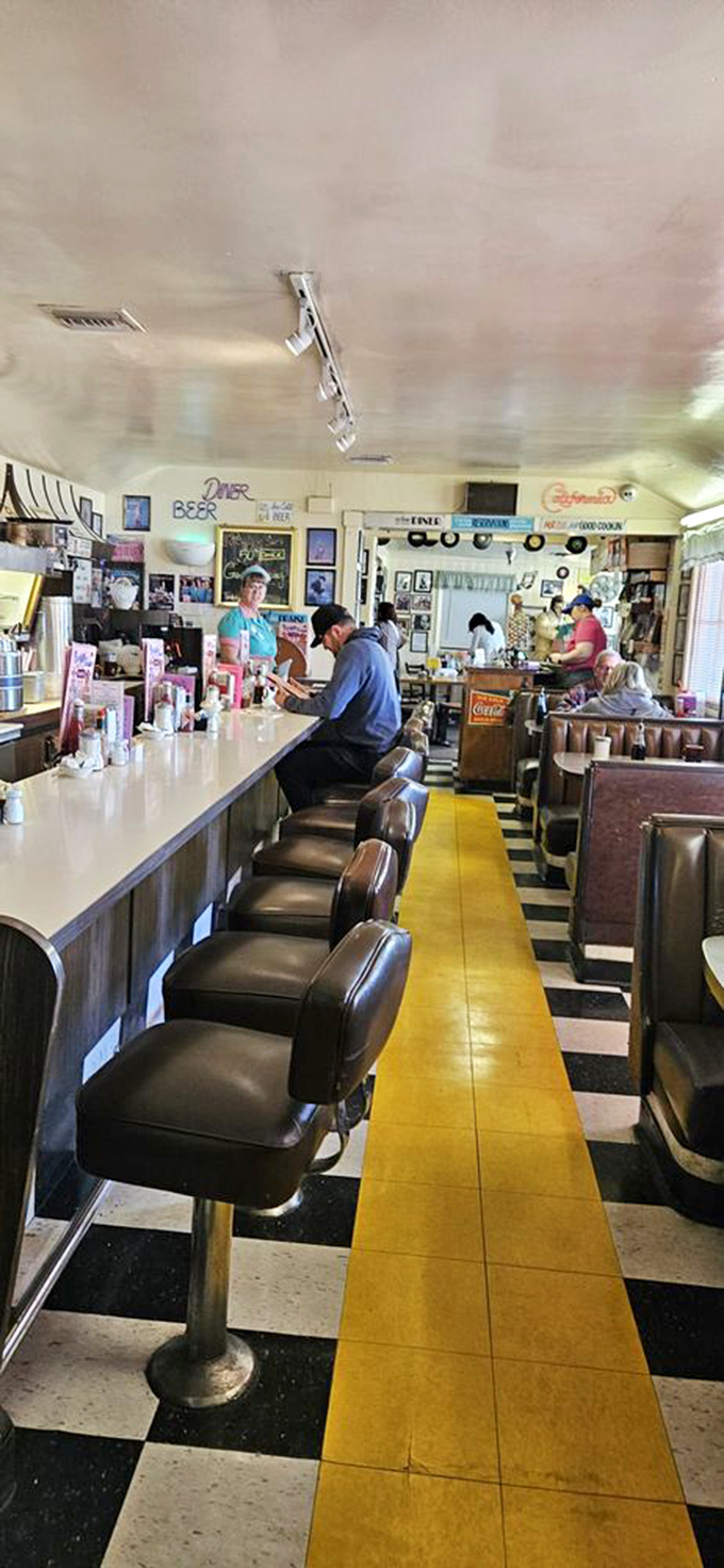 The classic diner counter&mdash;where strangers become friends over pie, and the yellow stripe leads you to happiness one stool at a time.