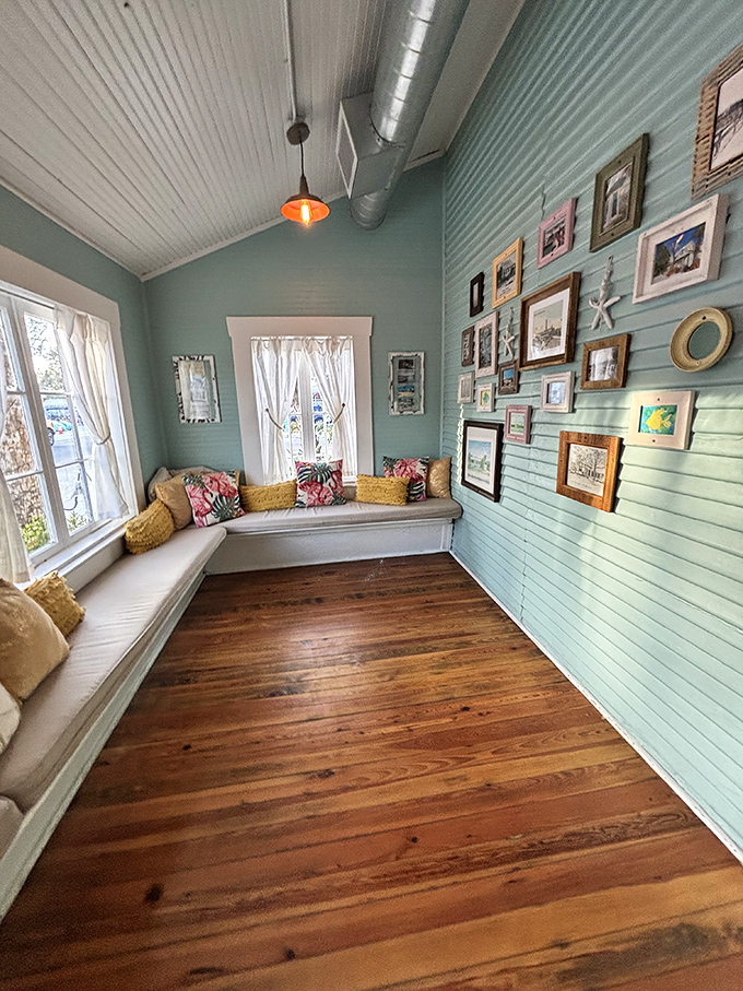 The mint-green waiting area feels like your stylish friend's beach house, where every framed photo has a story worth hearing.