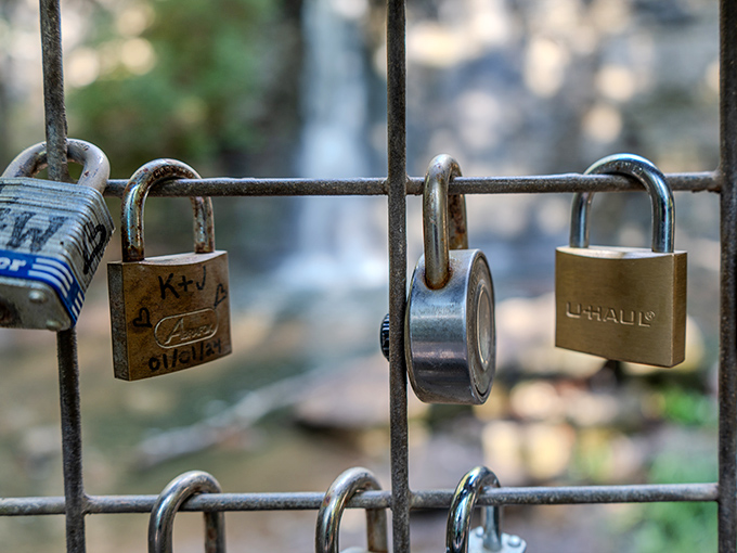 Modern-day wishes locked in metal. Visitors leave these padlocks as promises, with the falls as eternal witness&mdash;romance isn't dead, it's just gone outdoorsy.