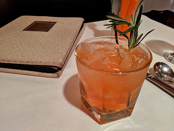 A cocktail that doesn't need an influencer to validate its existence. Garnished with fresh rosemary, this amber elixir promises good times and better conversations.