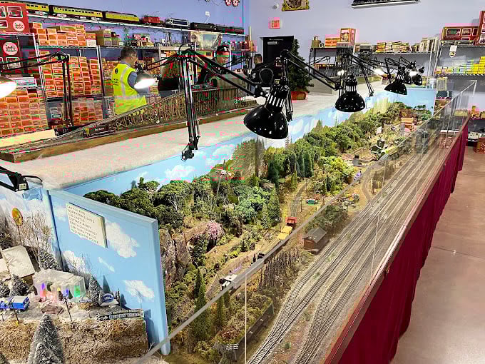 Meticulously crafted miniature landscapes showcase the artistry of model railroading, where tiny trains wind through mountains and valleys with lifelike precision.