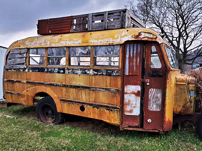 Even the transportation sits abandoned, this rusted school bus a reminder that some journeys from the infirmary were one-way trips.