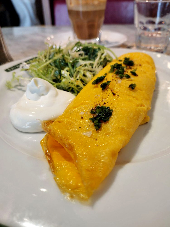 An omelet so perfectly executed it should come with its own gold medal and a standing ovation from French grandmothers everywhere.