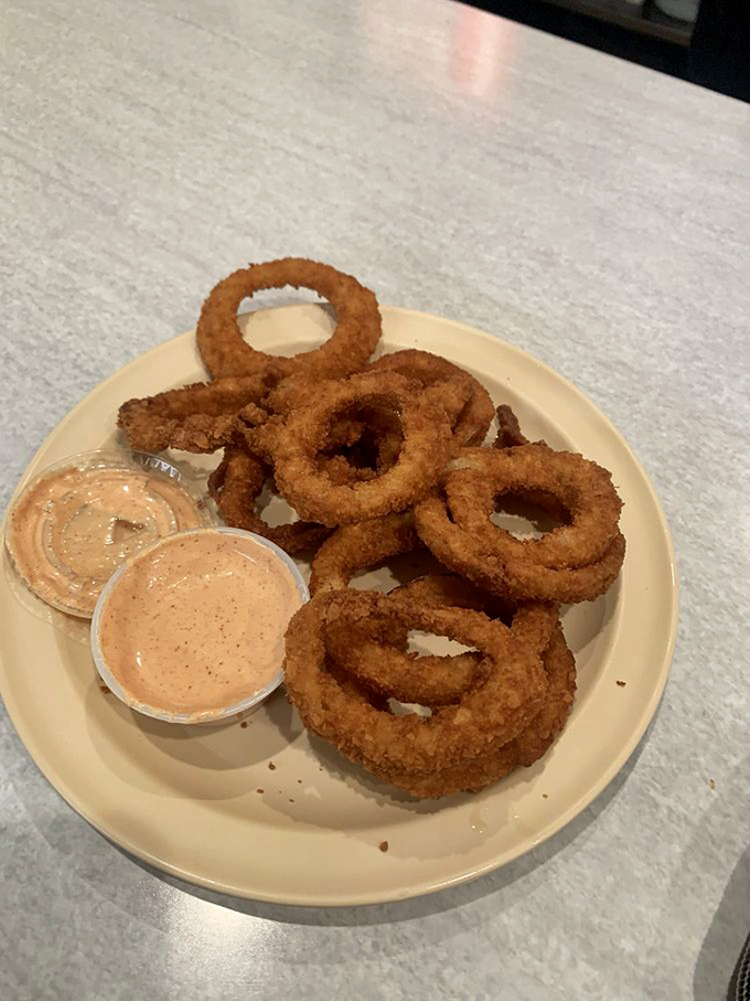 Onion rings with the perfect crunch-to-softness ratio&mdash;like edible jewelry that leaves your fingers happily greasy and your soul content.