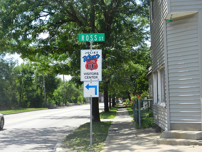 Route 66 signage reminds travelers they're on America's most legendary highway, where giants still roam free.