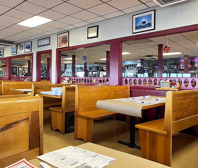 Wooden booths worn smooth by decades of happy diners &ndash; where every scratch and mark tells the story of feasts past.