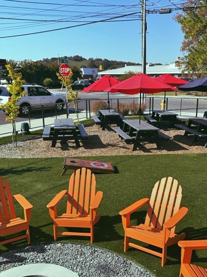 The outdoor seating area offers a splash of color against Tennessee's natural beauty. Those orange chairs aren't just seating&mdash;they're an invitation to linger longer.