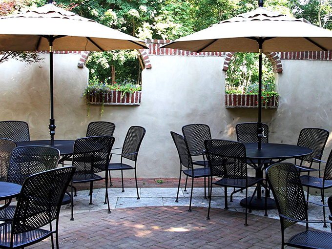 The secluded patio offers al fresco dining under market umbrellas, where brick and stucco create a Mediterranean feel in the heart of Delaware.