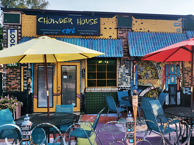 Al fresco dining with artistic flair. The outdoor patio offers a splash of coastal vibes, complete with umbrella-shaded tables perfect for summer evenings.