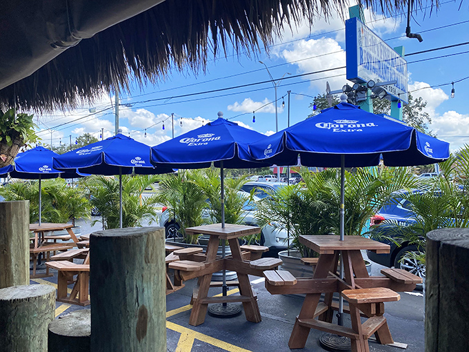Outdoor seating under those Corona umbrellas &ndash; where the Florida breeze carries conversations and the scent of the day's catch.