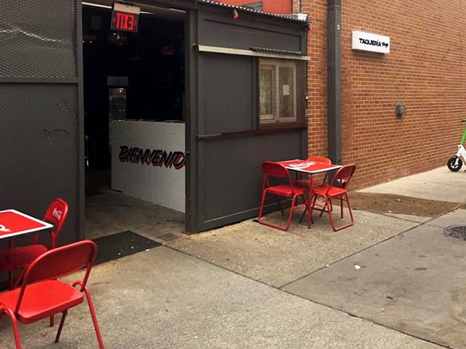 Those little red tables outside say, "Sure, we could get fancy, but wouldn't you rather put that energy into making perfect tacos?"