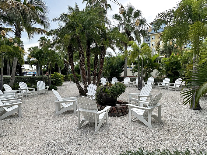 Adirondack chairs nestled among palm trees create Florida's version of a meditation garden. Serenity now, seafood later.