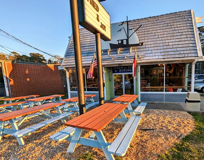 Blue picnic tables under autumn skies&mdash;where seafood tastes better and conversations flow like sweet tea.