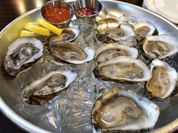 Fresh oysters on ice—proof that Hood's BBQ understands that sometimes the best cooking is no cooking at all. That mignonette sauce is the cherry on top.