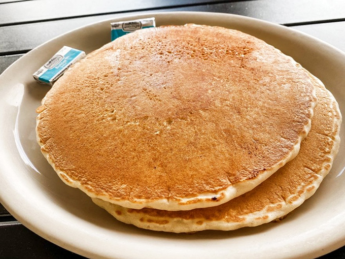 Pancakes so perfectly golden and fluffy they make you understand why people wait in line on Sunday mornings instead of sleeping in.