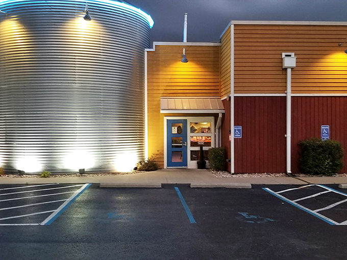 Even at night, that massive silo stands illuminated like a beacon, guiding barbecue pilgrims to their smoky destination after a day at the lake.